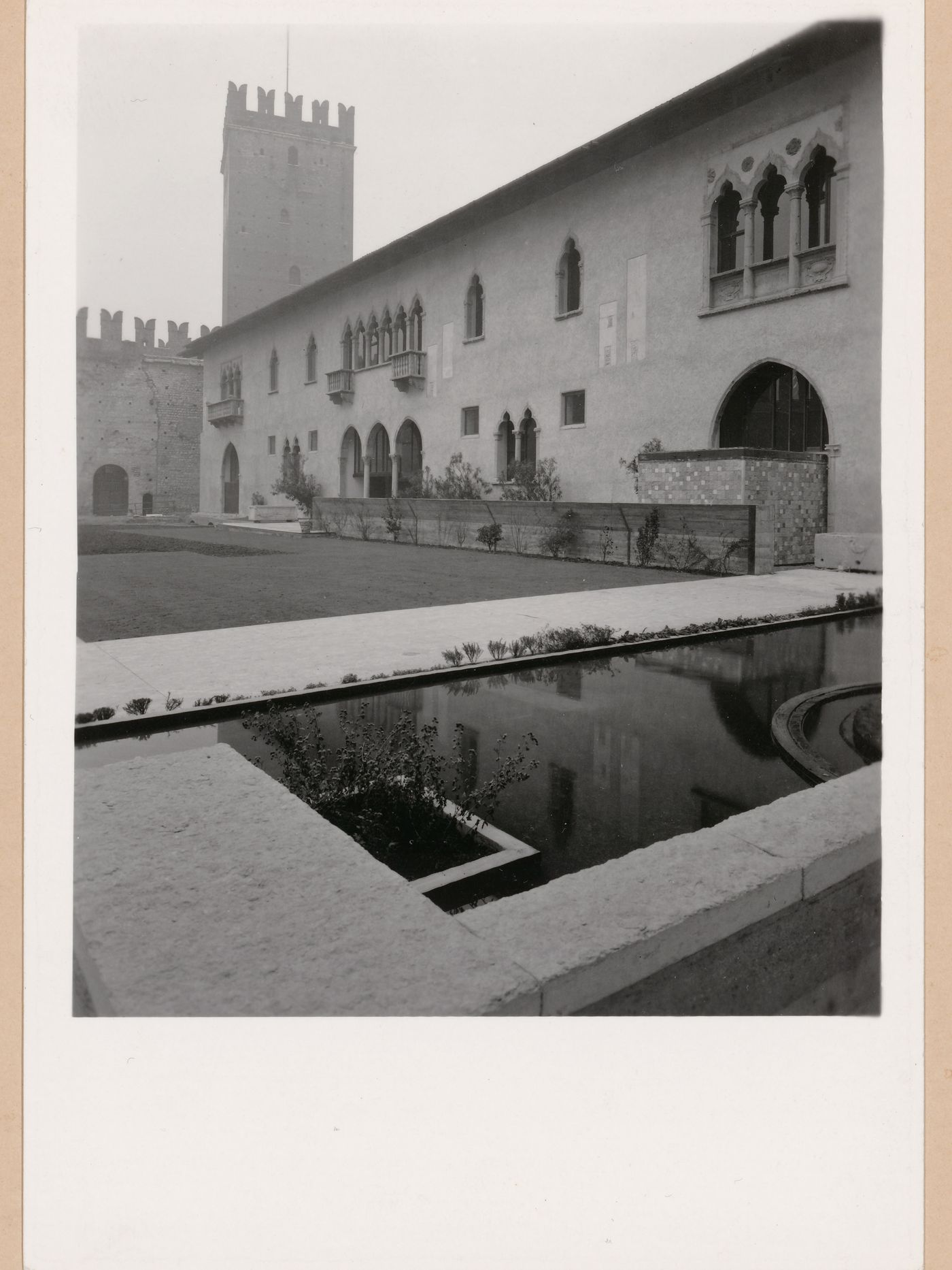 View of the courtyard showing a pool and the Torre del Mastio, Museo di ...