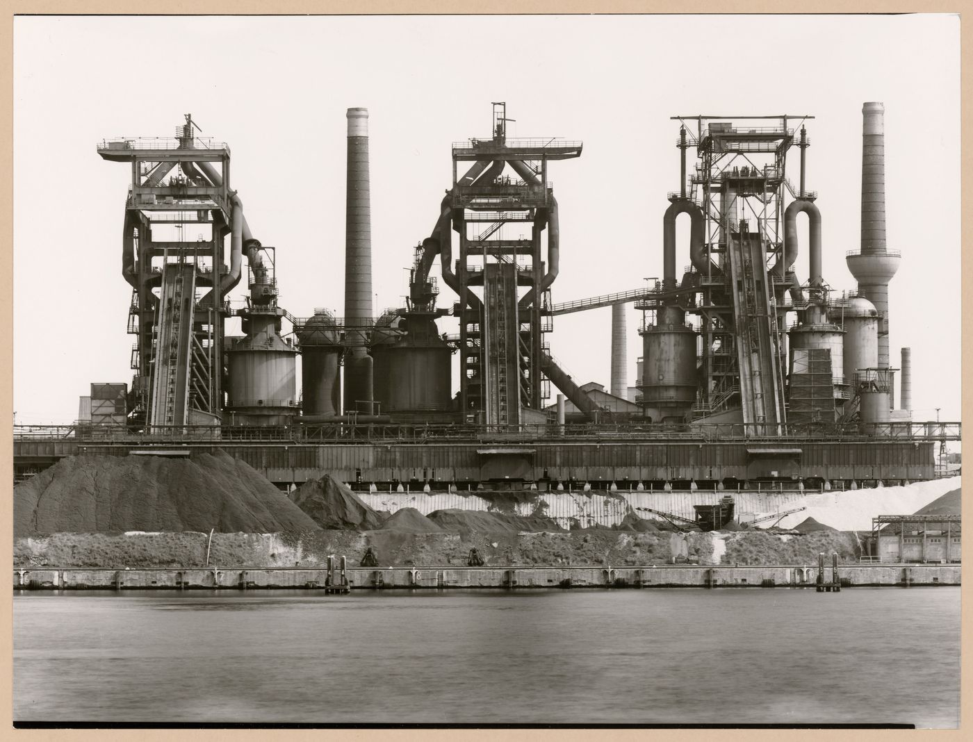 View of Metallhüttenwerk industrial plant showing blast furnace heads A ...