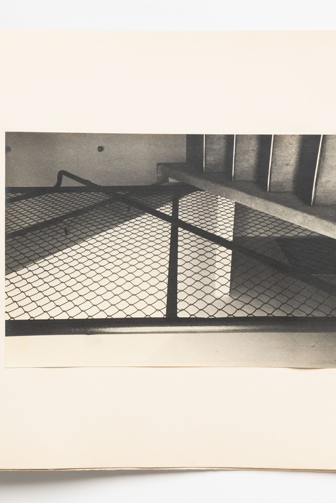 Interior view of stairwell and chain link partition, Hellerhof Housing ...